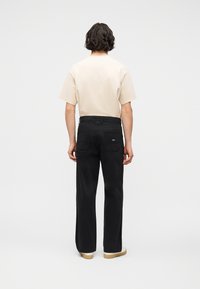 Jack & Jones JPSTALEX RAYE WORKER PANT - Pantaloni - tap shoe/negru ...