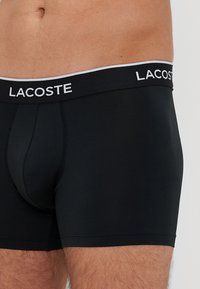 Lacoste Sport PERFORMANCE UNDERWEAR 3 PACK - Trunks - black - Zalando