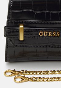 Guess SESTRI - Across body bag - schwarz/black - Zalando.co.uk