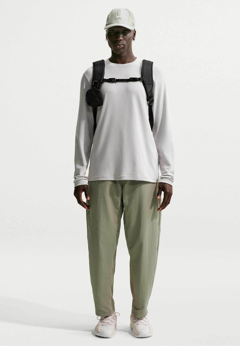 Nike Performance M NK DF NAC - Jogginghose - light army/pale ivory ...