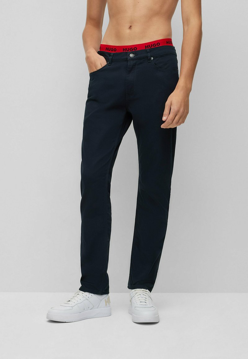 HUGO SLIM FIT JEANS - Straight leg jeans - dark blue fourteen ...