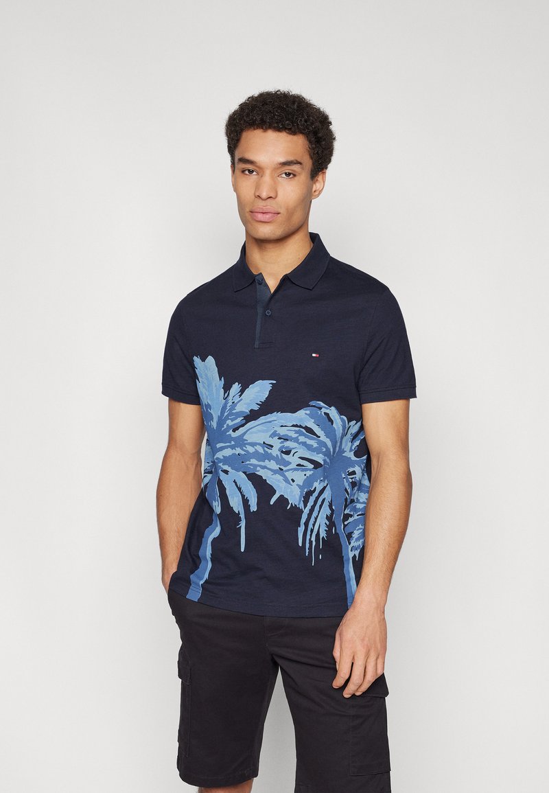 Tommy Hilfiger PALM PLACEMENT PRINT REG POLO - Polo - desert sky/azul ...