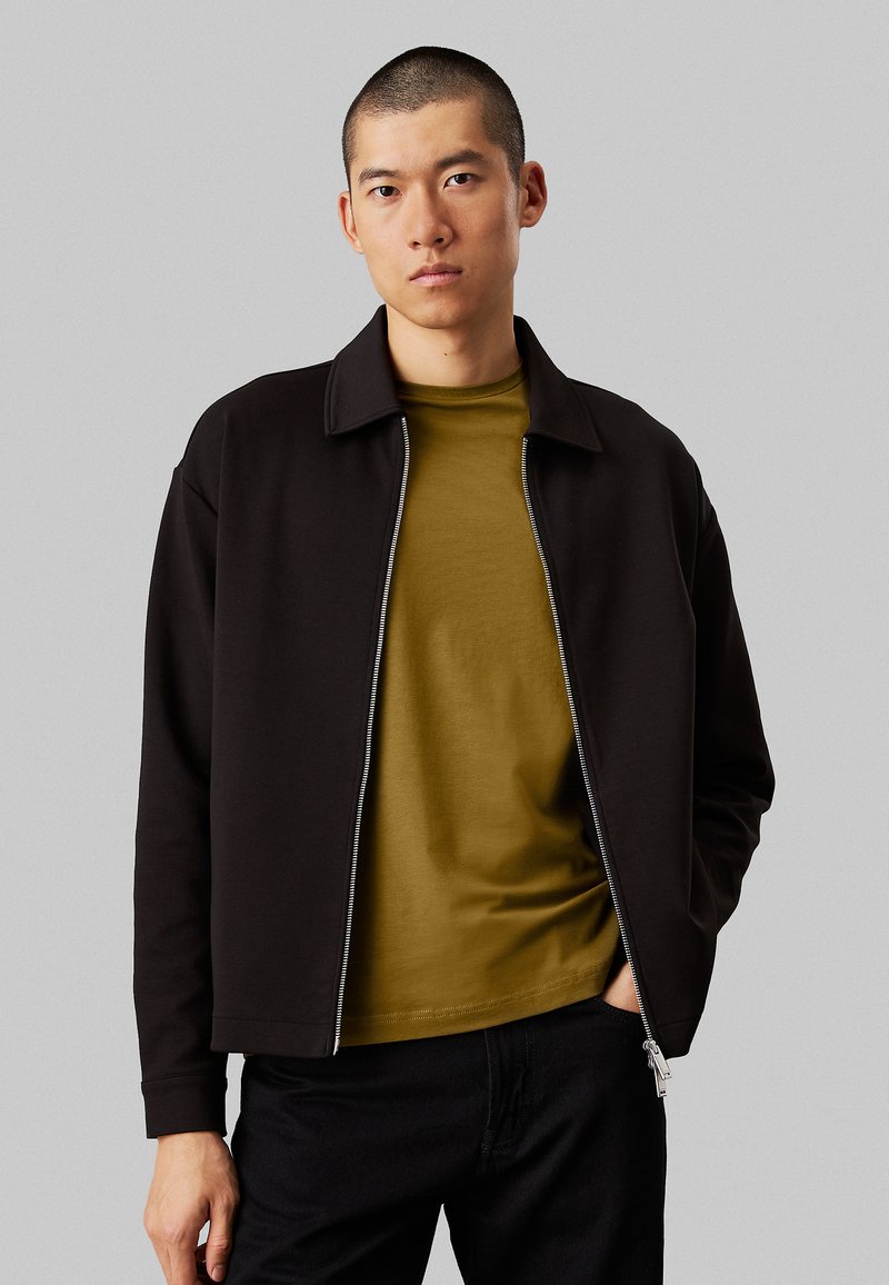 Calvin Klein RELAXED INTERLOCK ZIP UP - Light jacket - ck black/black ...