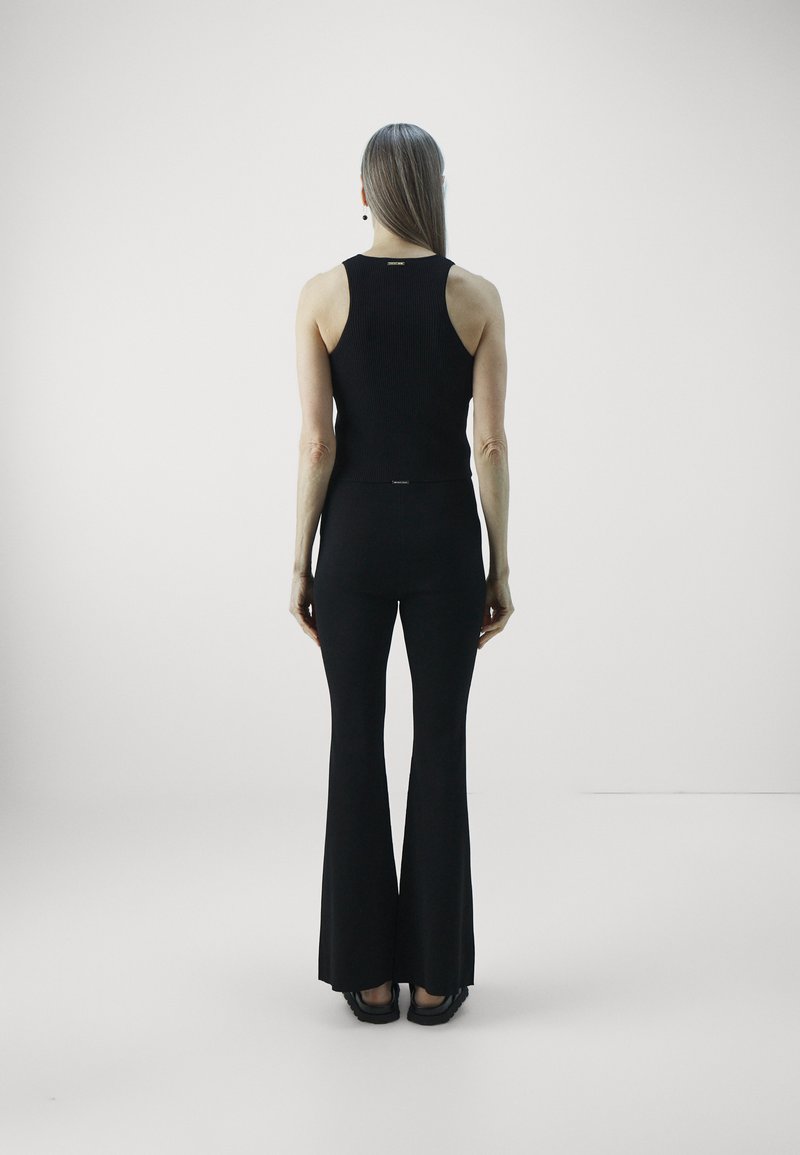 MICHAEL Michael Kors BELL BOTTOM - Pantalon classique - black/noir ...