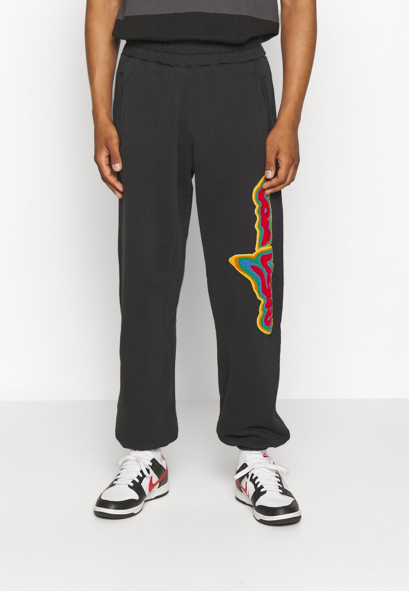 LOW LIGHTS STUDIOS® THERMAL JOGGER UNISEX - Tracksuit bottoms - black ...