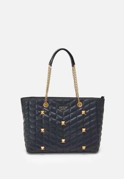 Guess Torbe i koferi za žene | Kupi online | ZALANDO