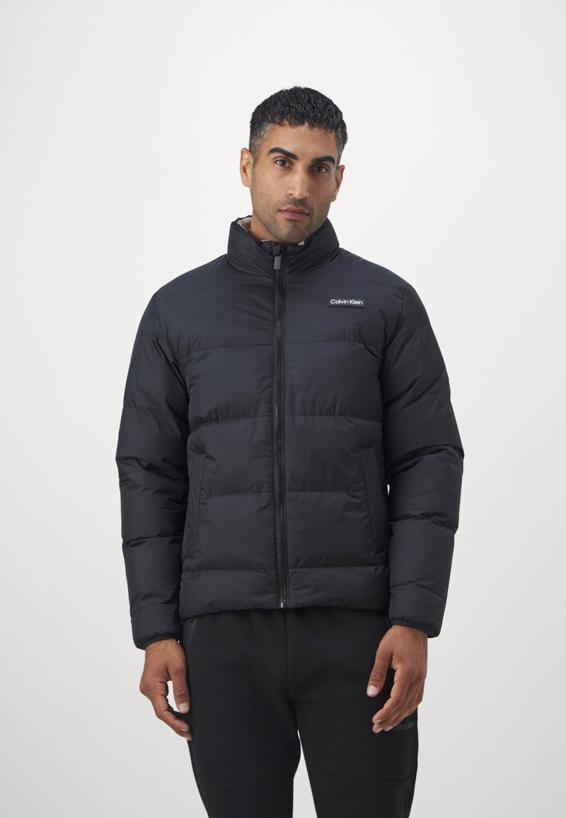 Calvin Klein Golf WINNSBORO PADDED JACKET - Winter jacket - black ...