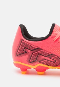 Puma FUTURE 7 PLAY FG/AG - Moulded stud football boots - sunset glow ...