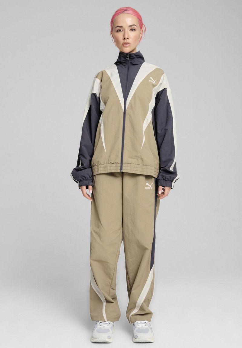 Puma CLUB DE COURSE UNISEX - Trousers - beige - Zalando.ie