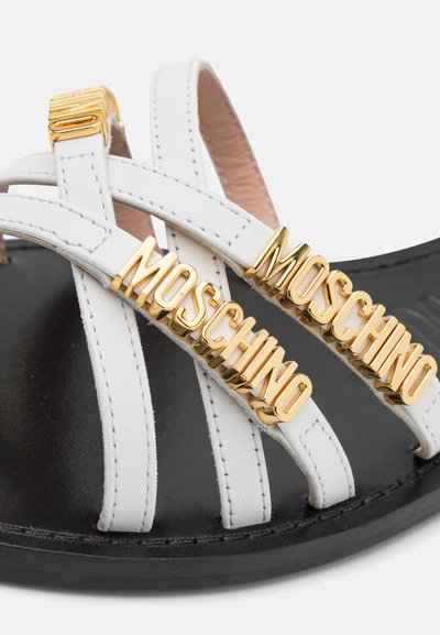 MOSCHINO MINI LETTERING SLIDE - Mules - bianco/white - Zalando.co.uk