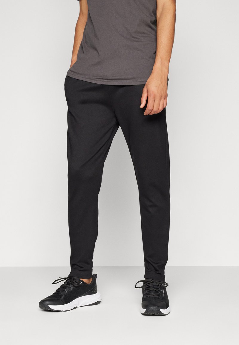 Lyle & Scott FLY TRACKIES - Tracksuit bottoms - jet black/black ...