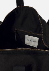GANT TONAL SHIELD DUFFLE BAG UNISEX - Weekender - ebony black/schwarz ...
