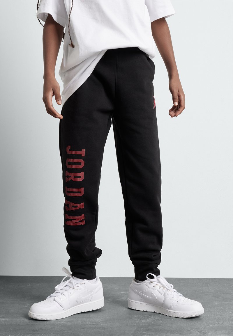 Jordan ESSENTIALS MEMBER PANT - Tracksuit bottoms - black - Zalando.co.uk