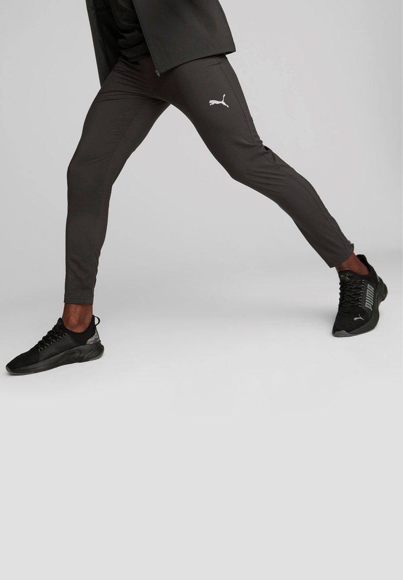 Puma RUN FAVORITE TAPERED M - Jogginghose - puma black/schwarz - Zalando.de