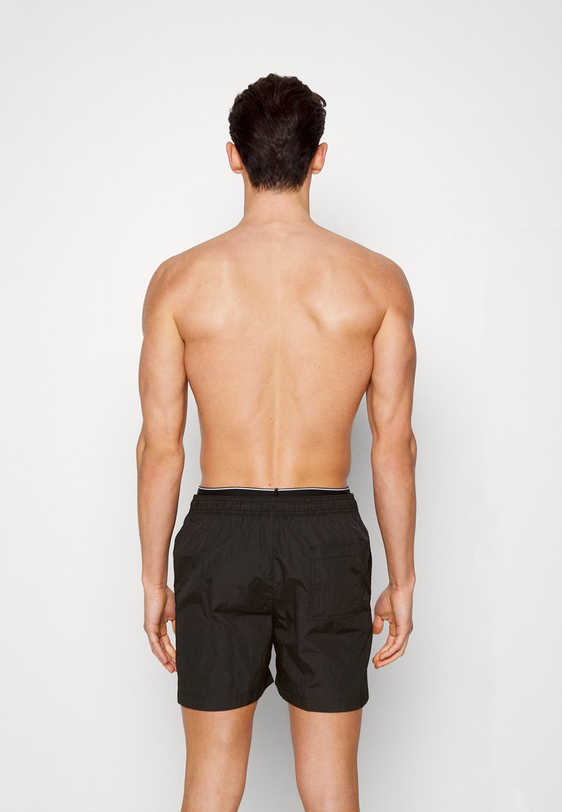 Calvin Klein Swimwear MEDIUM DOUBLE - Short de bain - black/noir ...