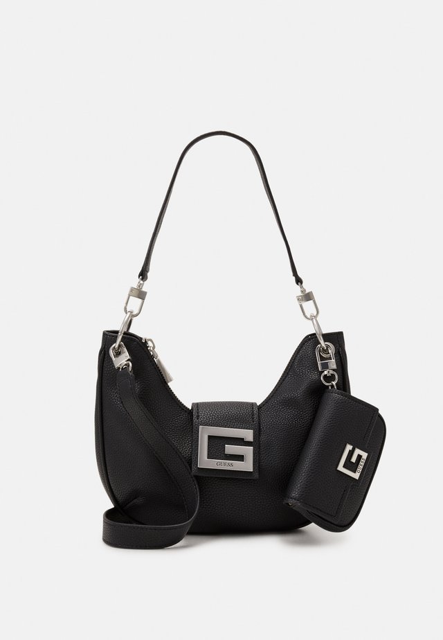 Torebki damskie Guess w ZALANDO - bezpłatna przesyłka