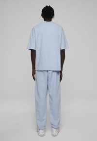 LOW LIGHTS STUDIOS® ARCTIC RING TEE UNISEX - T-Shirt print - sky blue ...