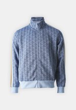 Lacoste MONOGRAM TRACK JACKET - Trainingsjacke - rill/globe/blau ...