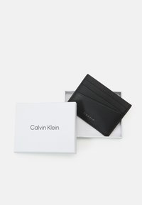 Calvin Klein DIAGONAL CARDHOLDER UNISEX - Portafoglio - black/nero ...