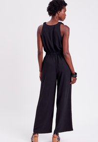 Cache Cache OVERALL MIT TRÄGERN - Jumpsuit - noir/schwarz - Zalando.at