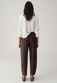 OPUS CITY PANTS IN FINE MELANGE LOOK - Trousers - coffee bean/brown ...