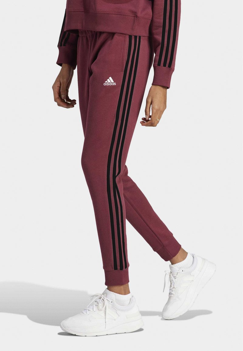 adidas Sportswear Tracksuit bottoms - shadow red/red - Zalando.co.uk