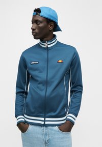 Ellesse MILAN TRACK - Tréning dzseki - blue/light blue/sötétkék ...
