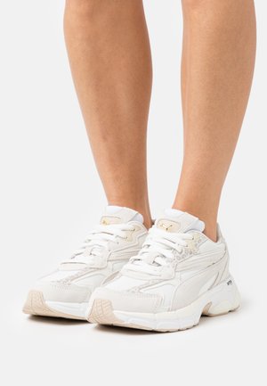 Puma TEVERIS NITRO VORTEX UNISEX - Zapatillas - alpine snow warm white ...