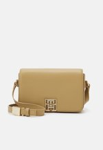 Tommy Hilfiger RESET CROSSOVER - Across body bag - classic khaki/camel ...