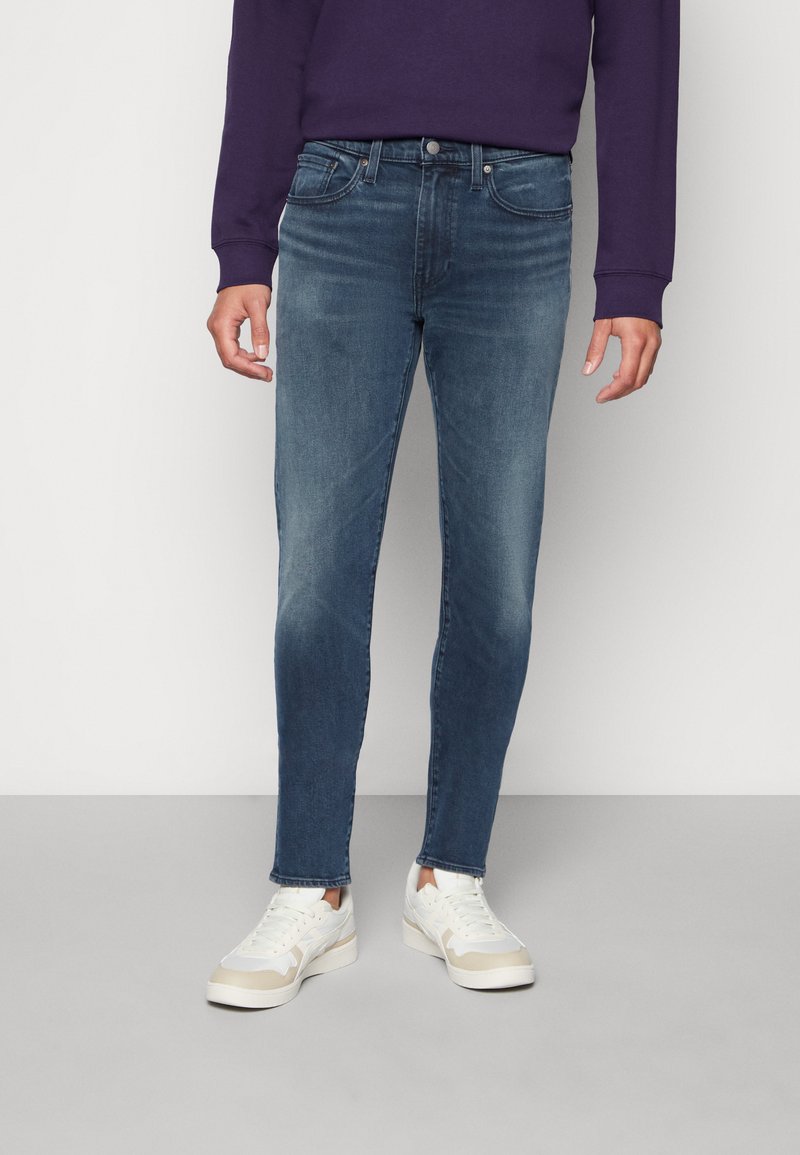 Levi's® 512™ SLIM TAPER - Jeans Tapered Fit - cinematographic/darkblue ...