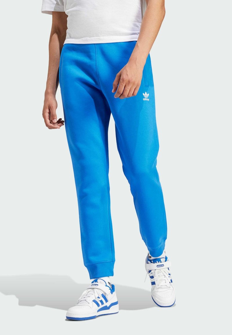 adidas Originals TREFOIL ESSENTIALS - Teplákové kalhoty - blue/modrá ...