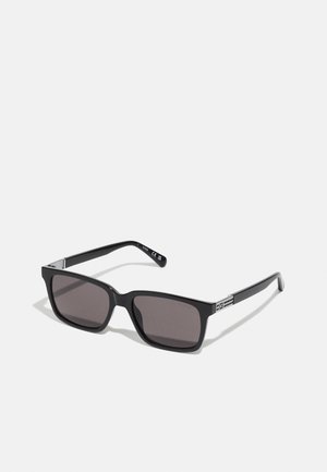 DKNY DK500S - Okulary przeciwsłoneczne - soft tortoise/brązowy - Zalando.pl