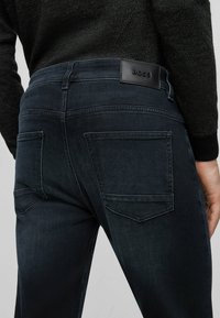 BOSS DELANO - Jeans Slim Fit - dark blue fourteen/dunkelblau - Zalando.at