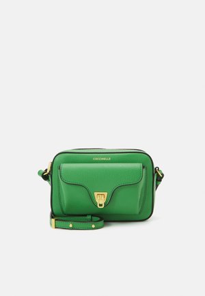 Kupi Coccinelle Torbe i koferi za žene online | Povrat do 100 dana ...