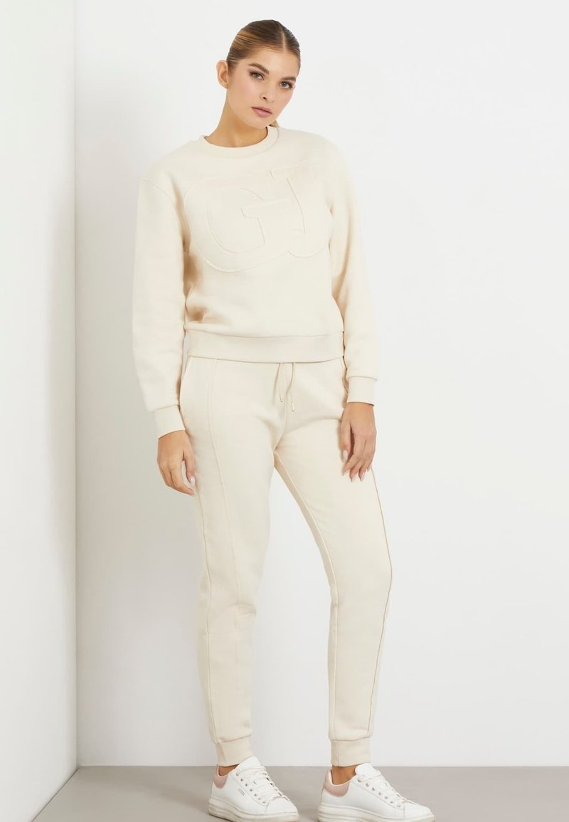 Guess JOGGING - Pantalon de survêtement - creme/beige - ZALANDO.BE