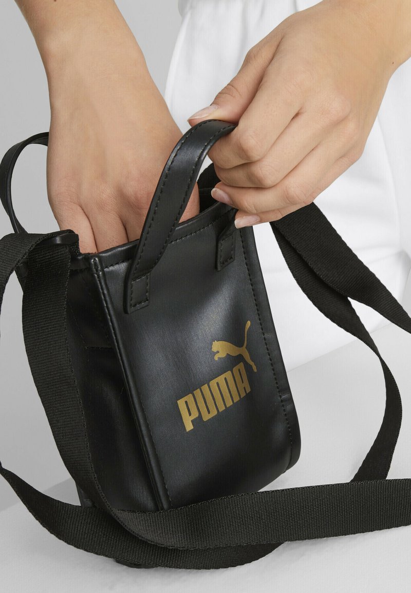 Puma CORE UP MINI - Handbag - black - Zalando.de