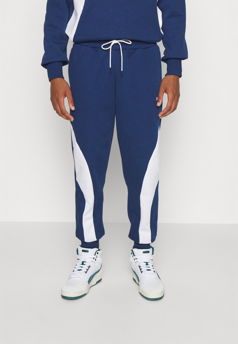 Puma BLUEPRINT FORMSTRIP PANT - Pantalon de survêtement - persian blue/white/bleu - ZALANDO.FR