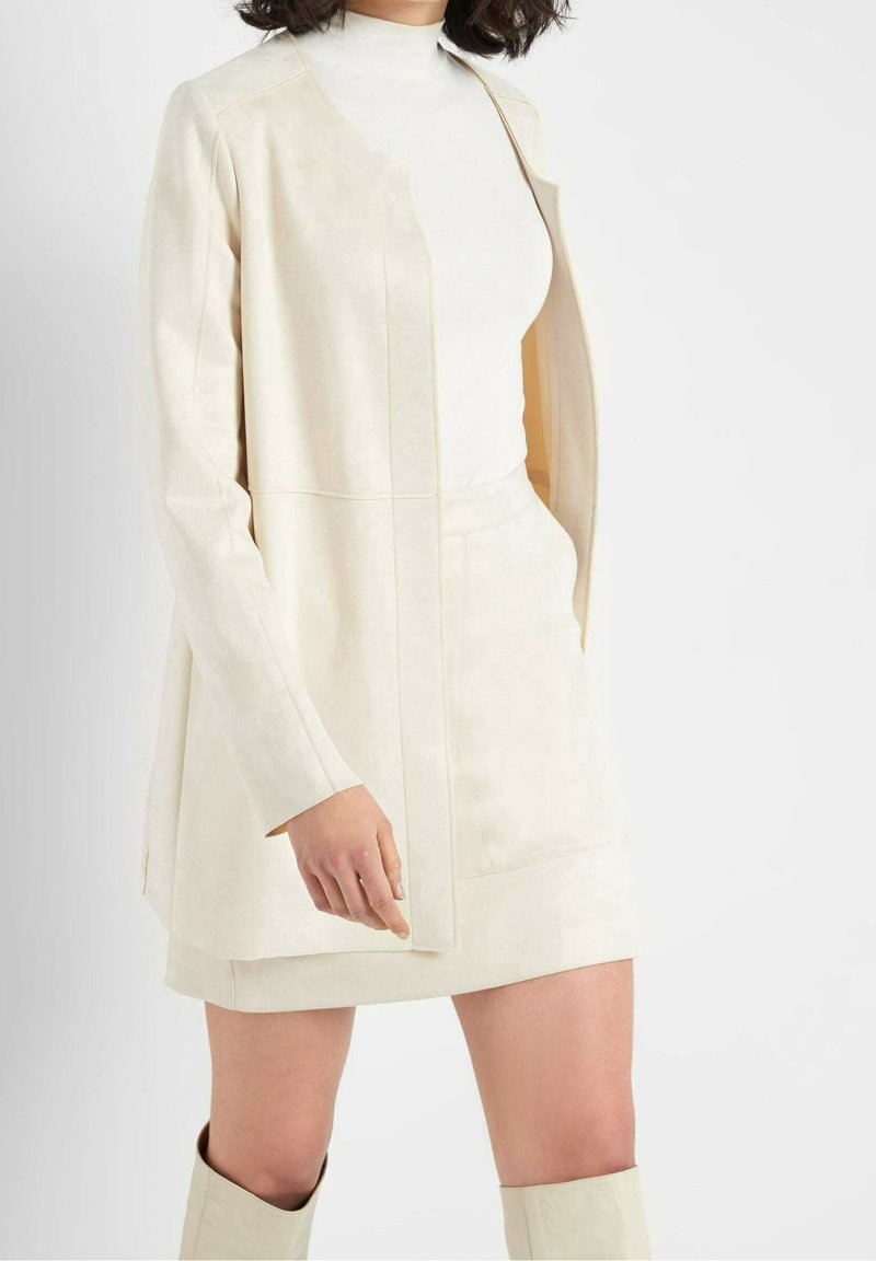 ORSAY Kort kappa / rock - beige - (Pre-owned) - Zalando.se