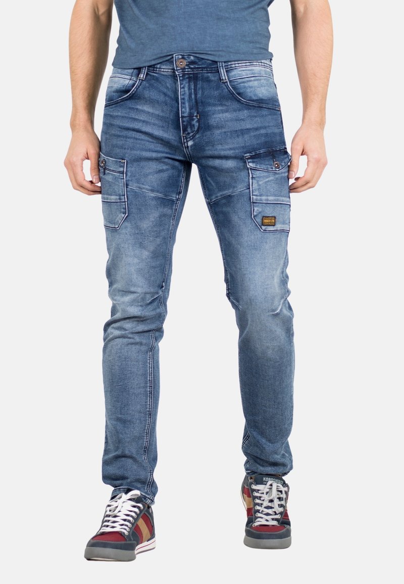 Koroshi Slim fit jeans - azul med medium blue/blue - Zalando.de