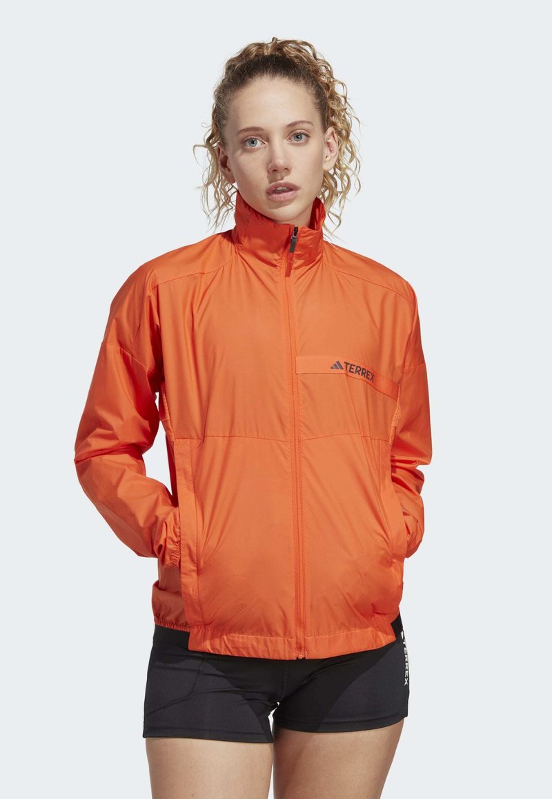 adidas Performance W MT WIND - Windbreaker - semi impact orange/orange ...
