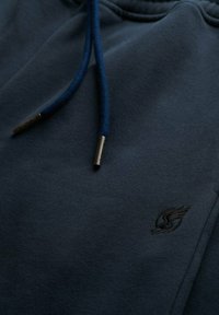 Superdry Tracksuit bottoms - blueberry navy/blue - Zalando