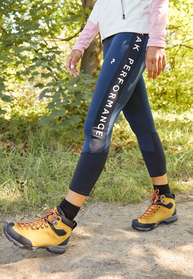 Peak Performance RIDER PANTS - 3/4 sports trousers - blue shadow/black ...