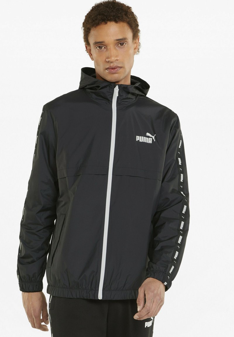 Puma ESS+ TAPE - Trainingsjacke - black/schwarz - Zalando.de