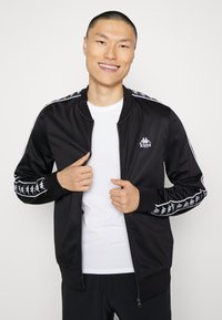 Kappa TRACKSUIT JACKET - Chaqueta de entrenamiento - caviar/negro ...