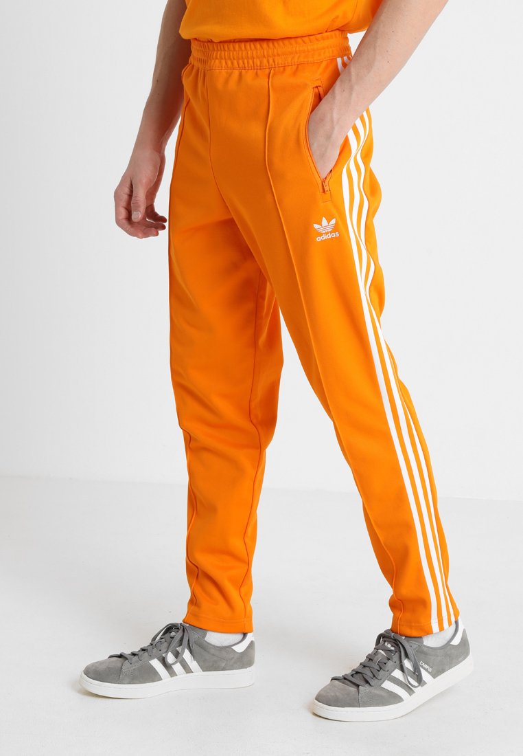 adidas Originals BECKENBAUER - Tracksuit bottoms - bright orange/orange ...