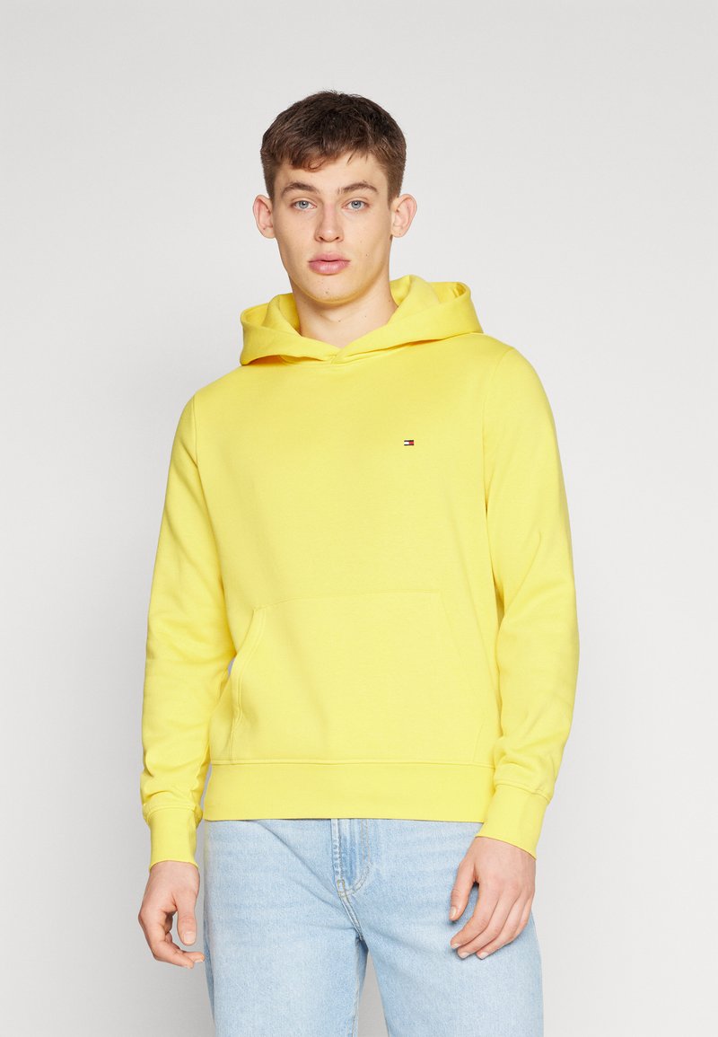 Tommy Hilfiger FLAG LOGO HOODY - Sweatshirt - eureka yellow/yellow ...