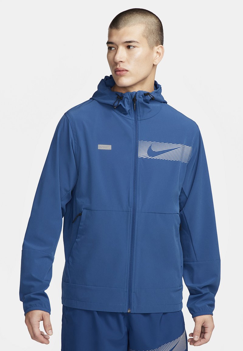 Nike Performance UNLIMITED - Chaqueta de running - court blue/azul ...