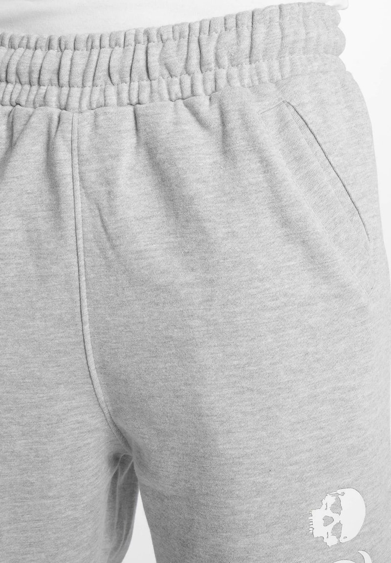 Thug Life Spodnie treningowe/szary - Zalando.pl