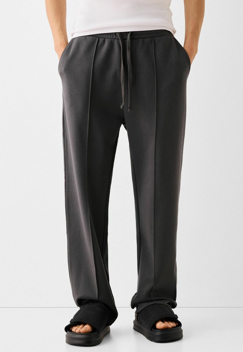 Bershka WIDE LEG INTERLOCK - Tracksuit bottoms - dark grey - Zalando