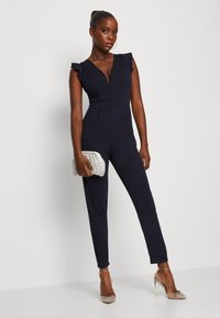 WAL G. RUFFLE WITH BACK INSERT - Jumpsuit - navy blue/mørkeblå - Zalando.no